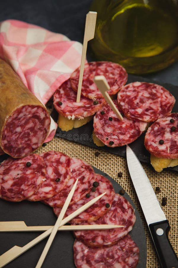 Slices of Cured Salami on Bread Stock Image - Image of table, salami ...