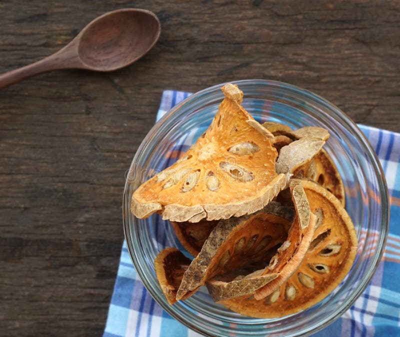 Slices of dried bael fruit stock image. Image of seed - 59601513