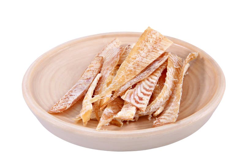 Slices of Dried Fish on Wooden Plate Isolated Over White. Stock Photo ...