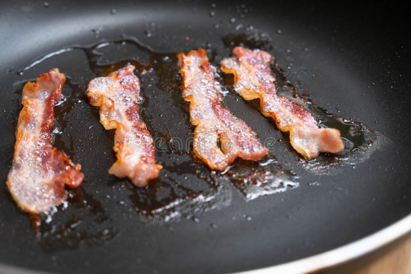 Slices of Fresh Fried Bacon in a Pan Stock Image - Image of meat ...