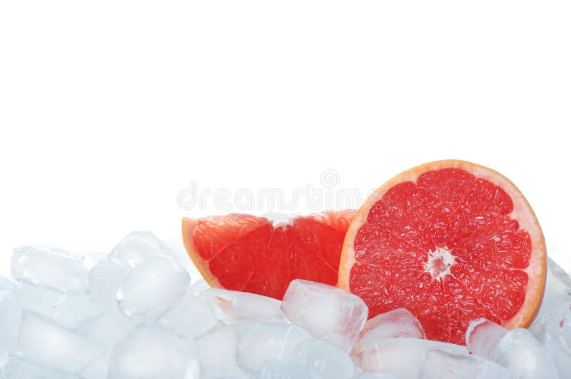 Slices of Grapefruit on Ice Cubes Against White Stock Image - Image of ...