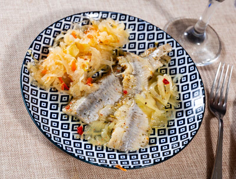 Slices Herring Fish with Pickled Cabbage, Served on Plate Stock Image ...