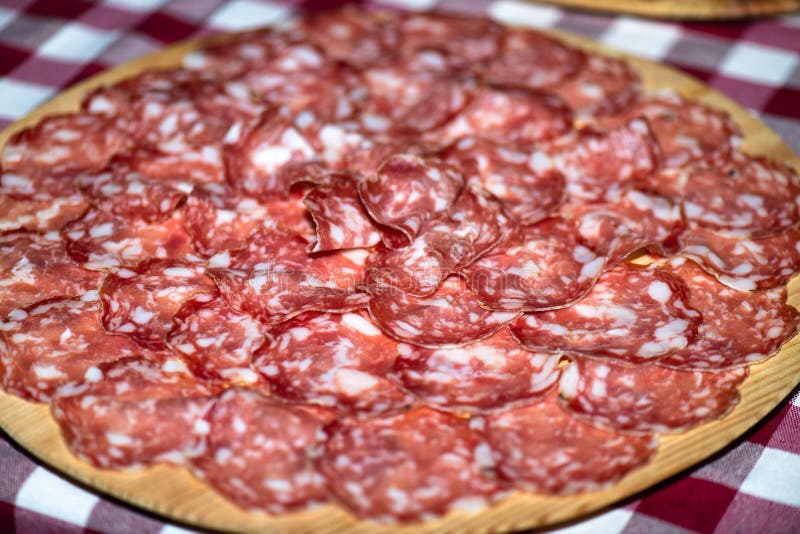 Slices of Local Local Salami on a Cutting Board Stock Image - Image of ...
