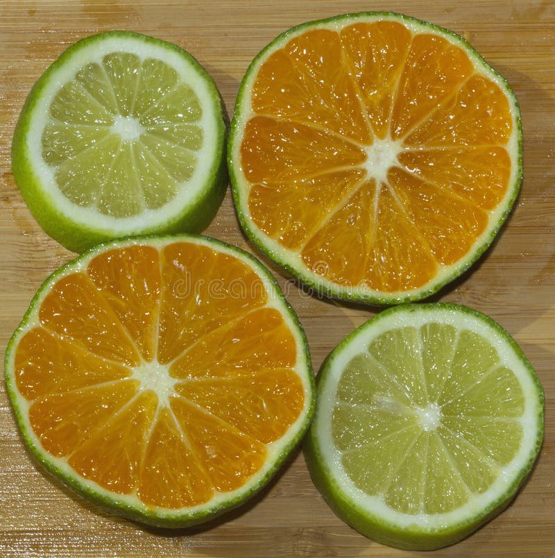 Slices of Mandarin and Lime Stock Image - Image of yellow, lemon: 79117807