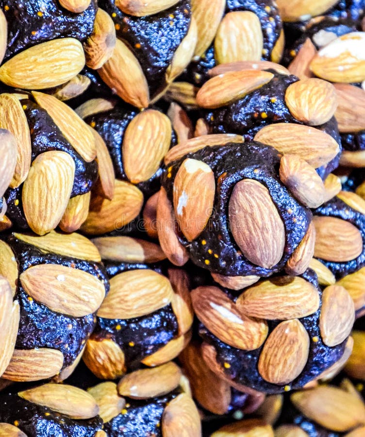 Slices of with Almonds. Almond with Sweets. Marmalade Balls with Nuts ...