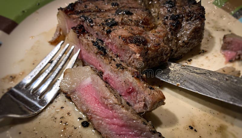 Medium Cooked Steak stock image. Image of slices, steak - 187041115