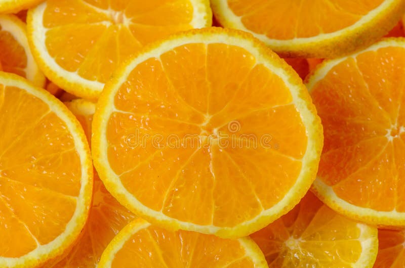 Slices of Orange on an Orange Background Stock Illustration ...
