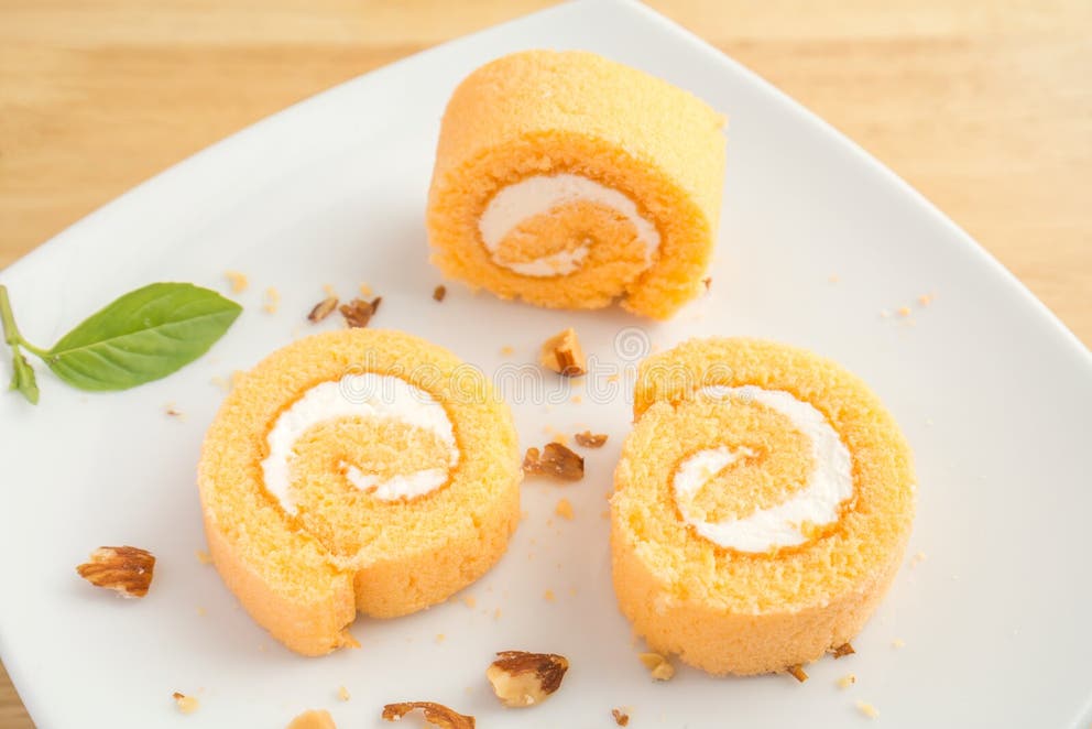 The Slices of Orange Roll Cake Stock Image - Image of appetizing ...