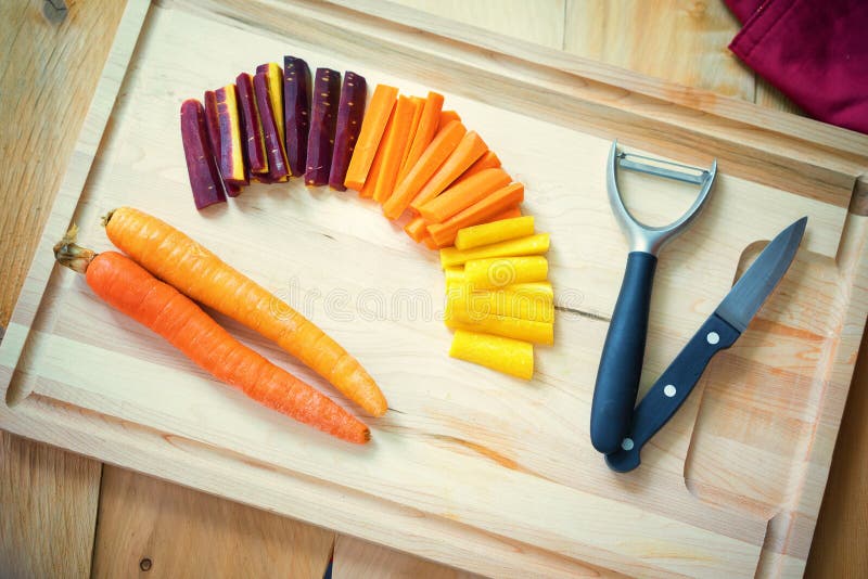 Slices of Organic Carrots in a Wood Table Stock Image - Image of ...