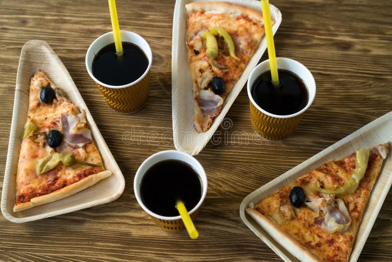 A Slices of Pizza is on a Wooden Plate. Stock Image - Image of meal ...