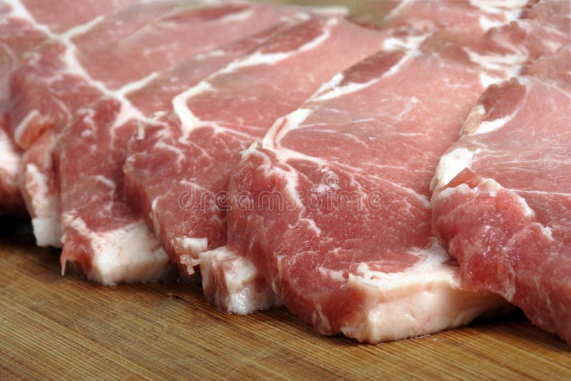 Slices of pork. stock image. Image of board, fresh, white - 12700663