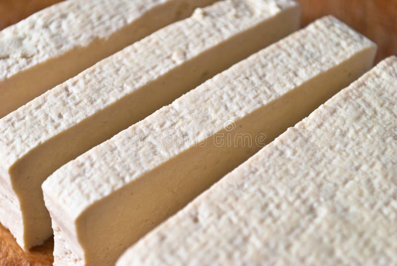 Slices of raw tofu stock photo. Image of alternative - 70745248