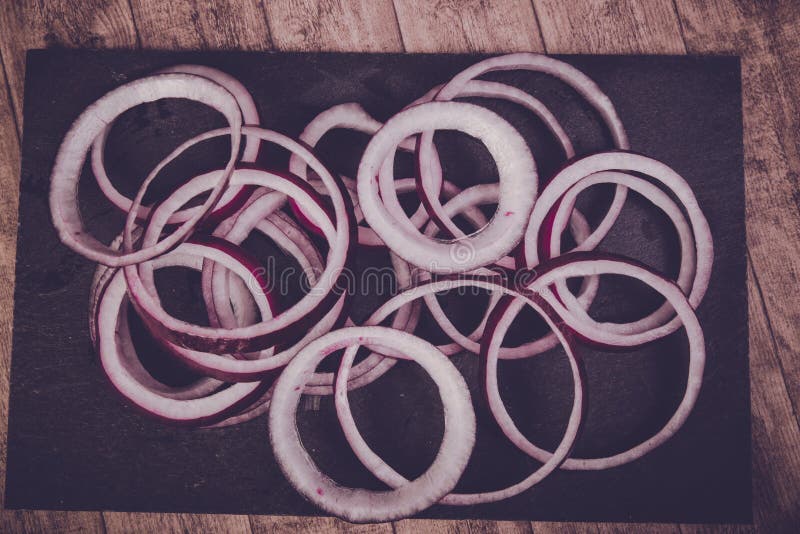 Slices of red onion plate stock image. Image of tasty - 110056095
