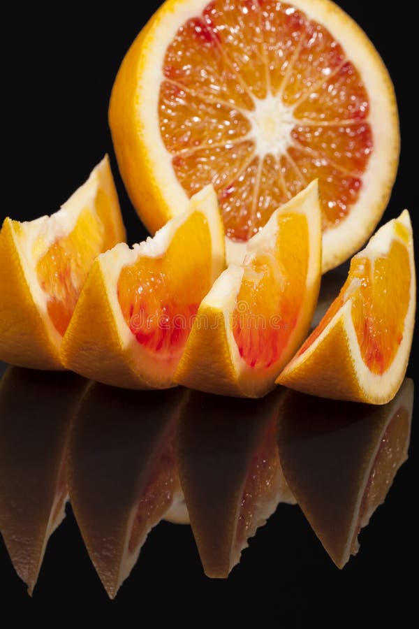 Slices of Red Orange Isolated on Black Background Stock Photo - Image ...