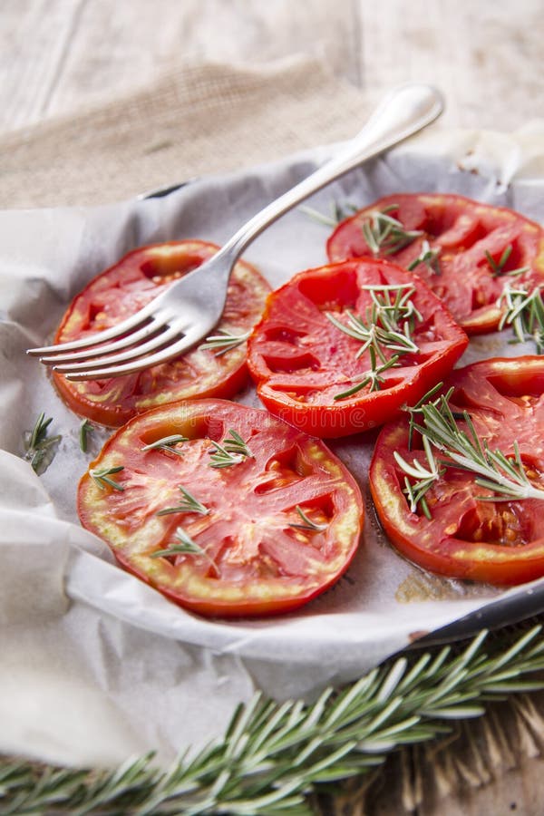 Slices of roasted tomatoes stock photo. Image of roast - 43304644
