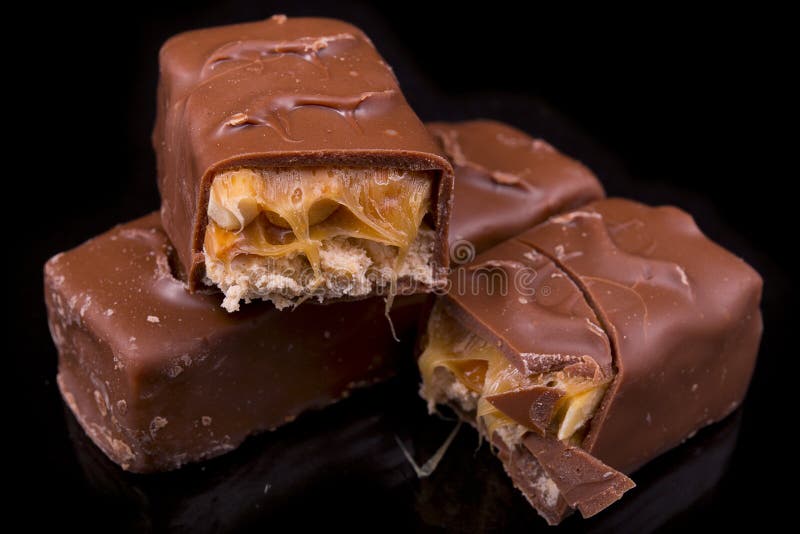 A Mountain of Chocolate Bars Stock Photo - Image of candy, black: 1945538