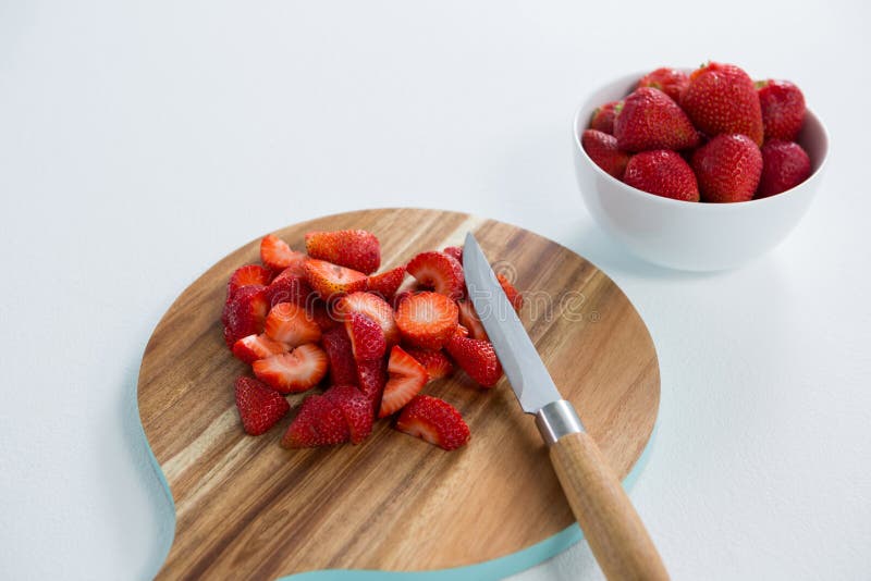 Slices of Strawberries on Chopping Board Stock Image - Image of ...
