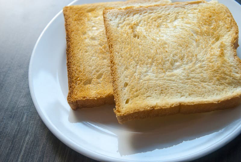 Slices of Toast on Wood Table Stock Image - Image of organic, breakfast ...