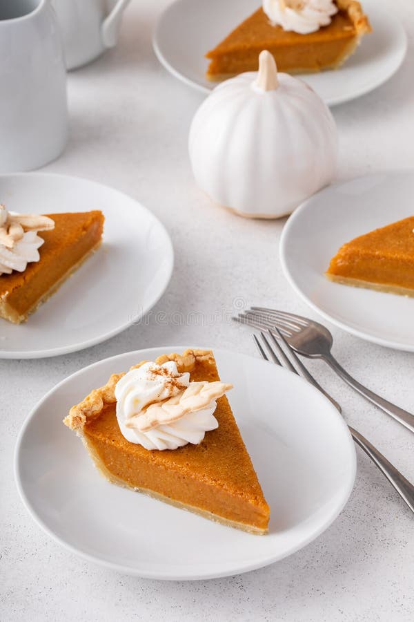 Slices of Traditional Pumpkin Pie in a Light and Bright Setting Stock ...