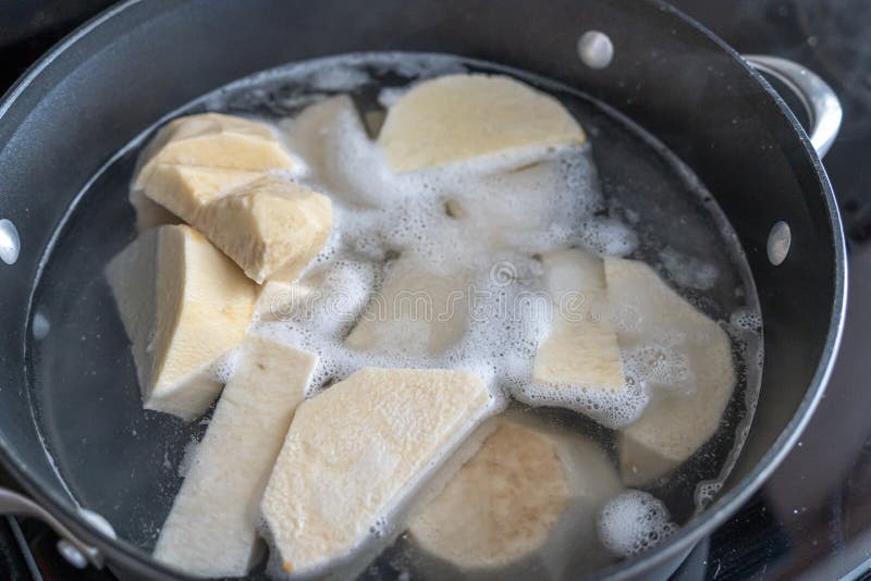 Slices of Yam Boiling in a Pot for Lunch Stock Photo - Image of stove ...