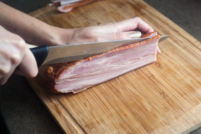 Slicing bacon stock image. Image of slicing, bacon, meat - 28106589