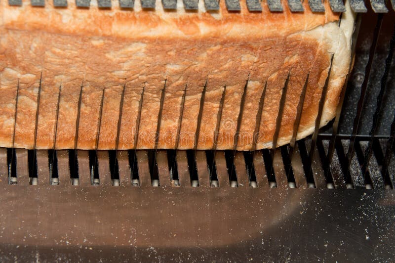 Slicing Bread stock photo. Image of fresh, commercial - 18402398
