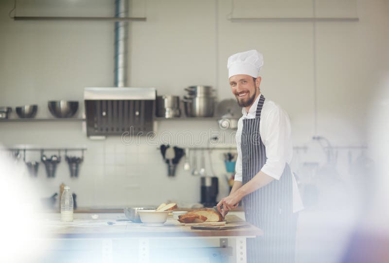 Slicing bread stock image. Image of slicing, happy, working - 93684479