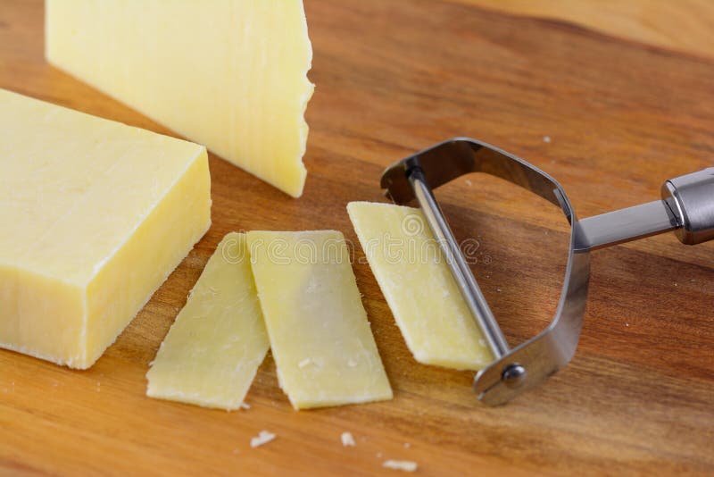 Slicing cheese stock image. Image of wire, cuisine, edible - 43007099