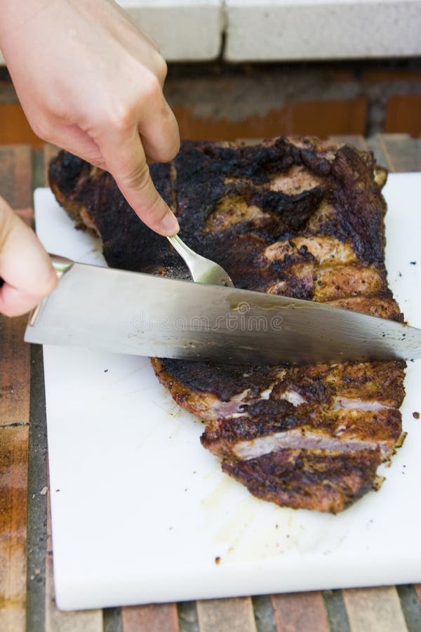 Slicing cooked meat stock photo. Image of steak, cutting - 15294750