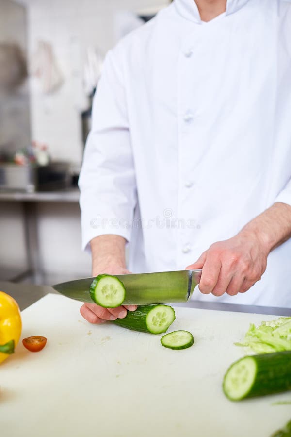 Slicing cucumber stock image. Image of occupation, cookery - 92351685