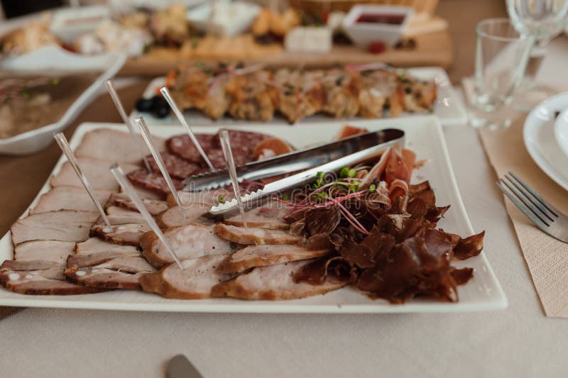 Slicing Different Types of Meat. Meat Snacks on the Table. Wedding ...