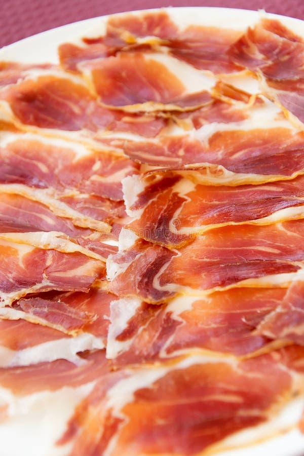 Slicing jamon. stock photo. Image of food, meat, snack - 34130224