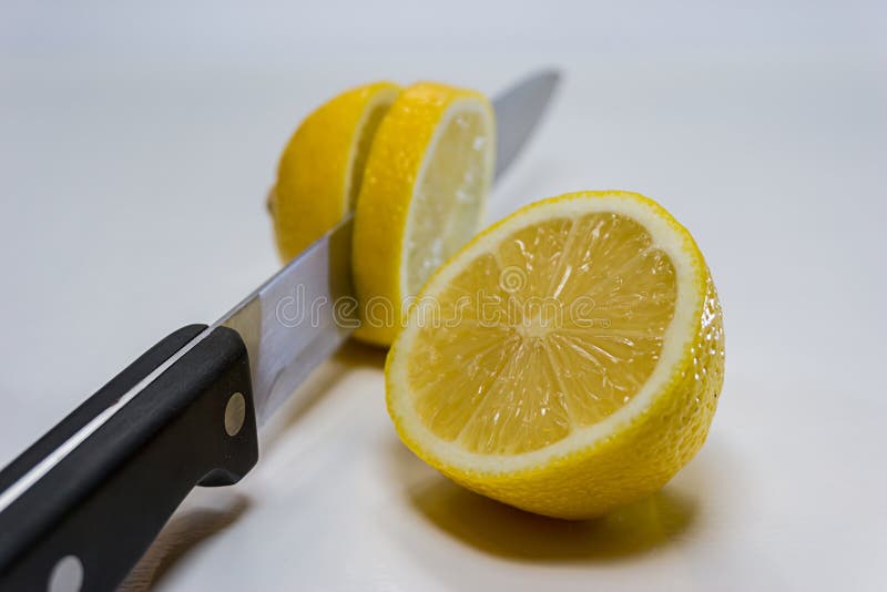 Slicing lemon stock image. Image of slice, cure, peel - 77225737
