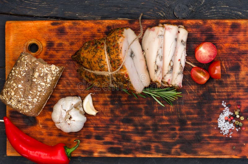 Slicing Meat on the Kitchen Board. Homemade Meat and Spices Stock Photo ...