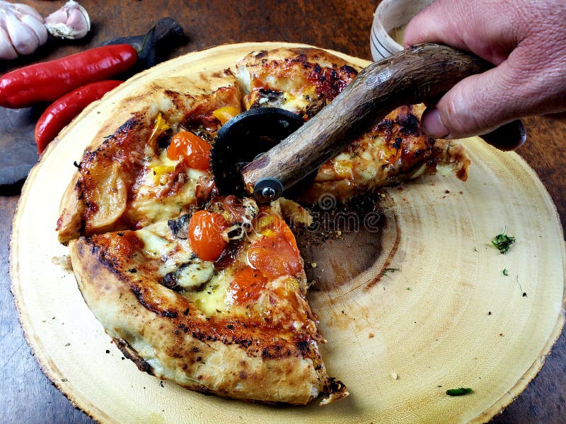 Slicing Pizza with Wooden Handle Stock Image - Image of gourmet, handle ...