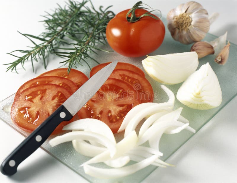 Slicing a tomato stock photo. Image of summer, gratin - 23705718