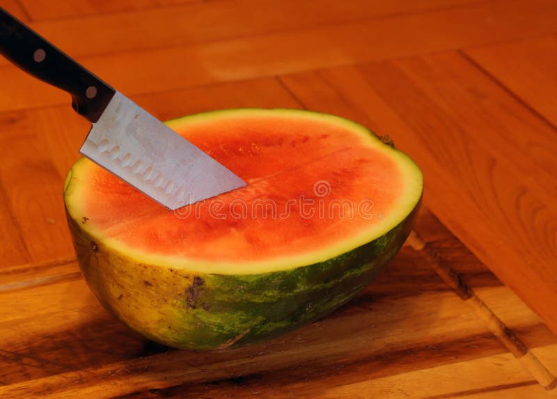 Slicing a watermelon stock photo. Image of healthy, light - 95417536