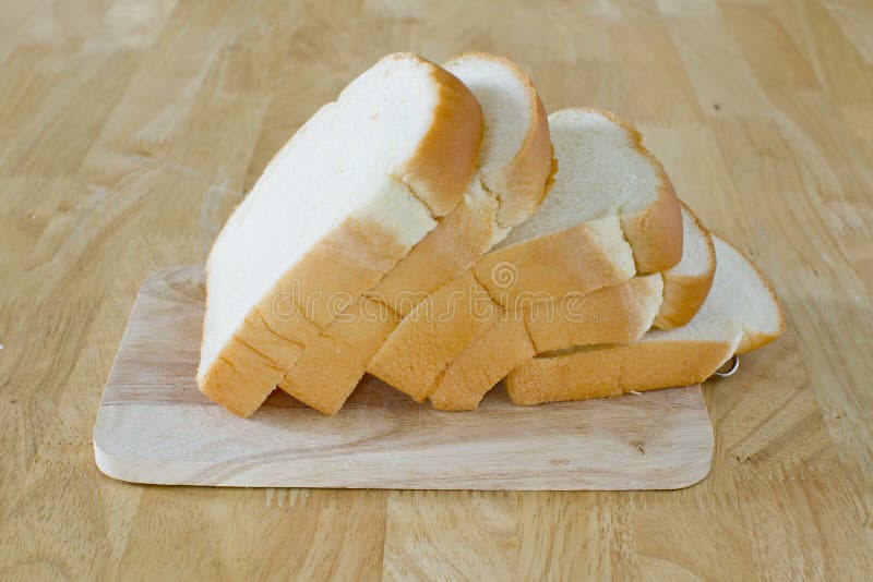 Slide Bread on Wooden Cutting Board Stock Image - Image of bread ...
