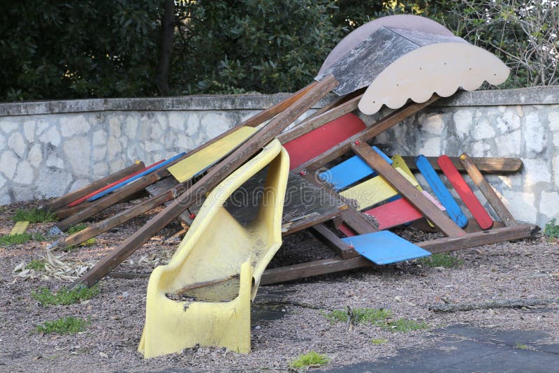 Slide Broken and Abandoned in a Deserted Playground after the Di Stock ...