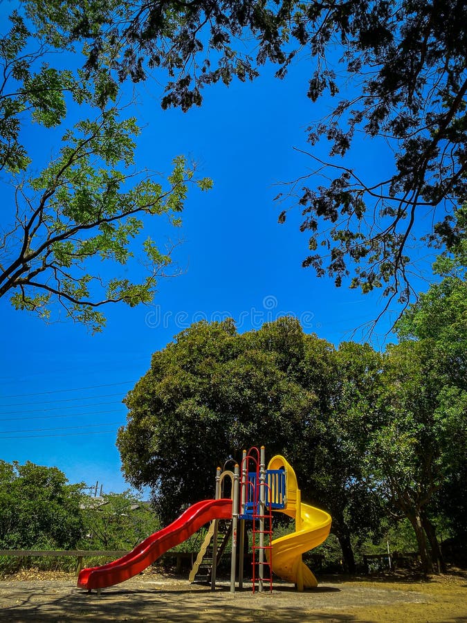 Slide with a Cool and Beautiful Atmosphere with a Blue Sky Stock Image ...