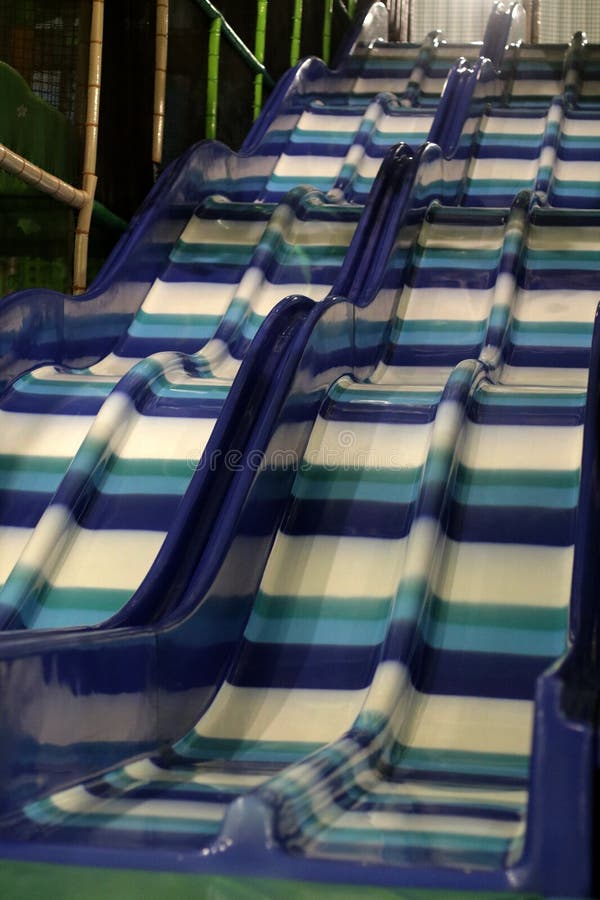 A Slide in an Indoor Playground Stock Photo - Image of amusement, climb ...