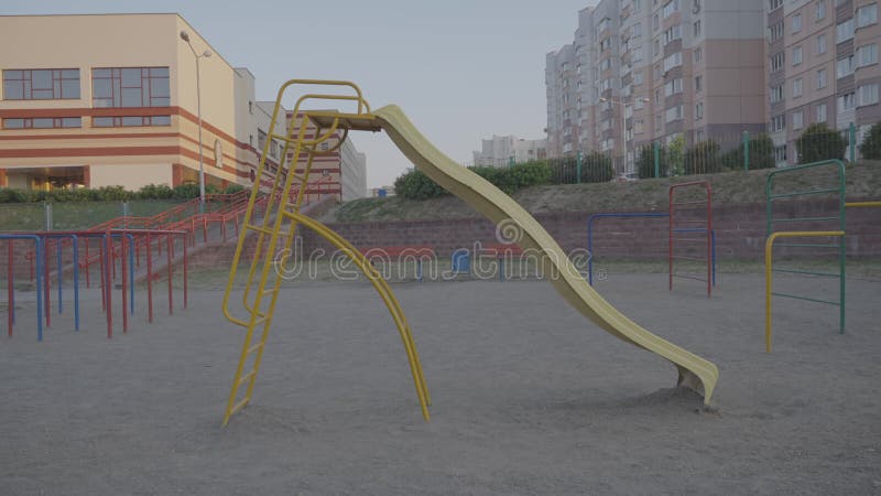 Slide on Playground with Horizontal Bars on Sandy Surface Stock Video ...