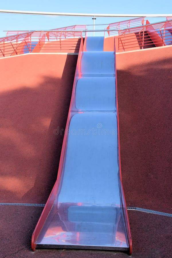 Slide. stock image. Image of metallic, long, kids, fall - 86019687