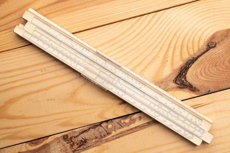 Slide Rule on a Wooden Table, Top View, Macro. Stock Image - Image of ...
