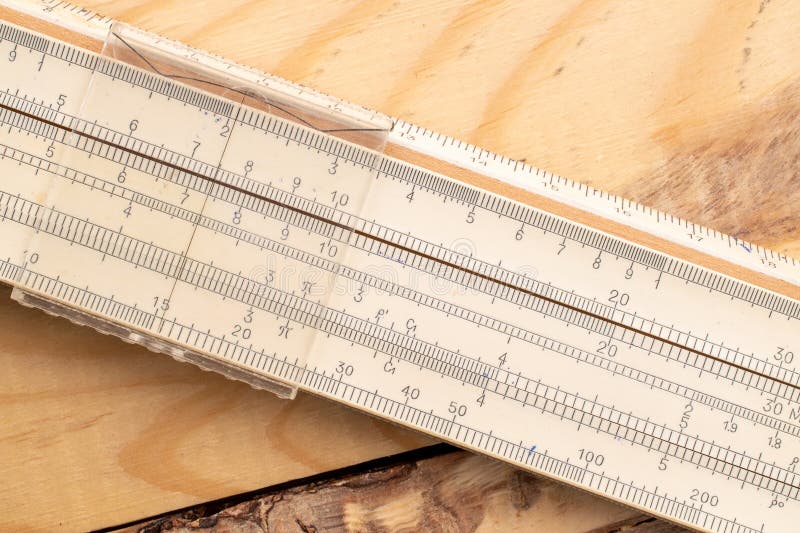 Slide Rule on a Wooden Table, Top View, Macro. Stock Photo - Image of ...