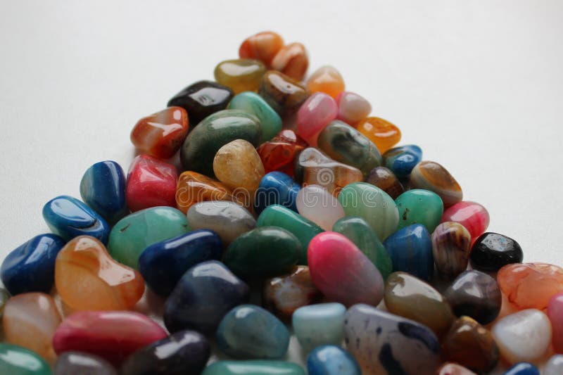 A Slide of Shiny Multi-colored Quartz Stones Isolated on White Stock ...