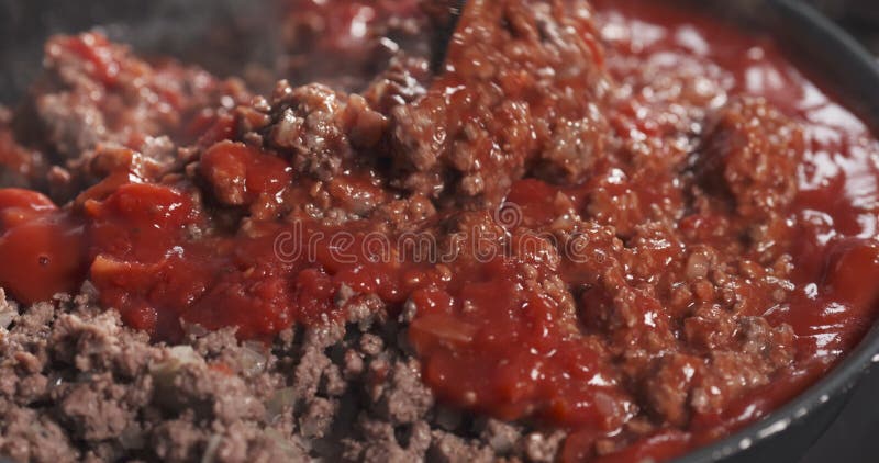 Slide Shot of Mixing Tomato Paste with Roasting Minced Beef in a Pan ...