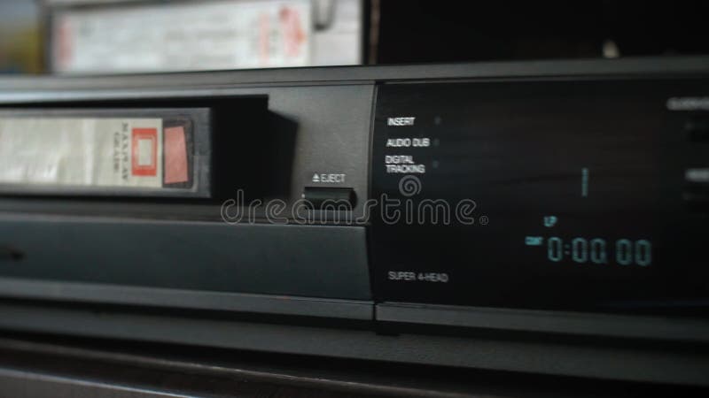 VHS Cassette Ejecting from Video Cassette Recorder. Stock Video - Video ...