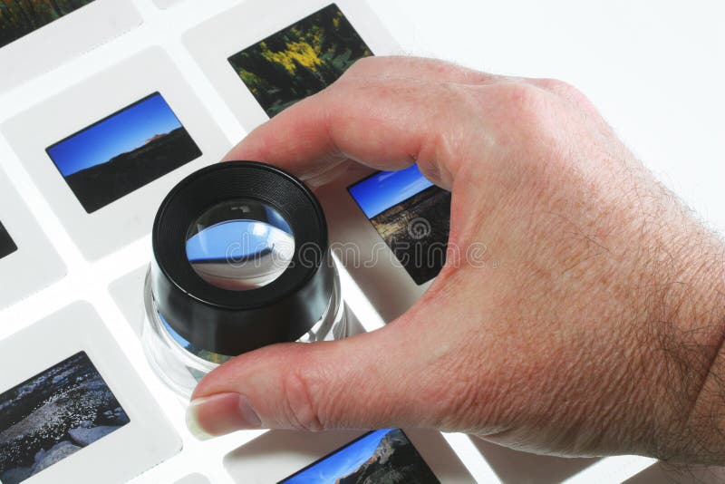 Slides on Light Box with Loupe Stock Photo - Image of film, inspect ...