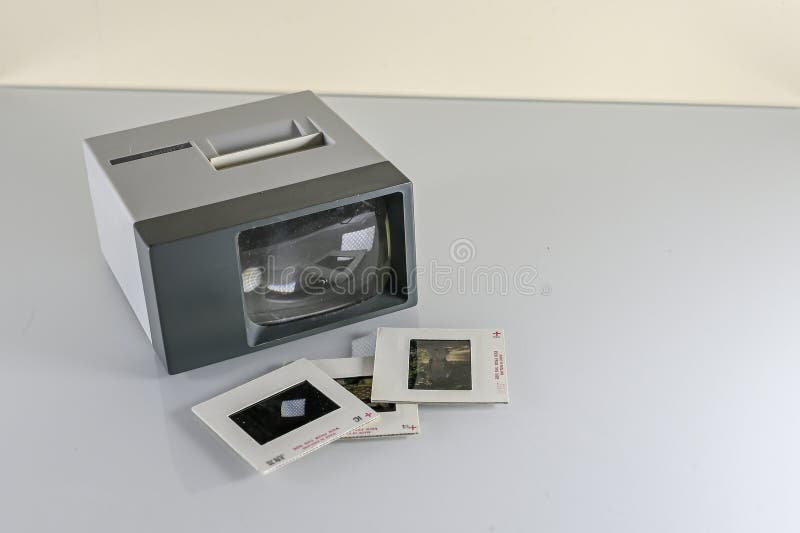 Slides Scattered on a Table and Slide Viewer Editorial Photo - Image of ...